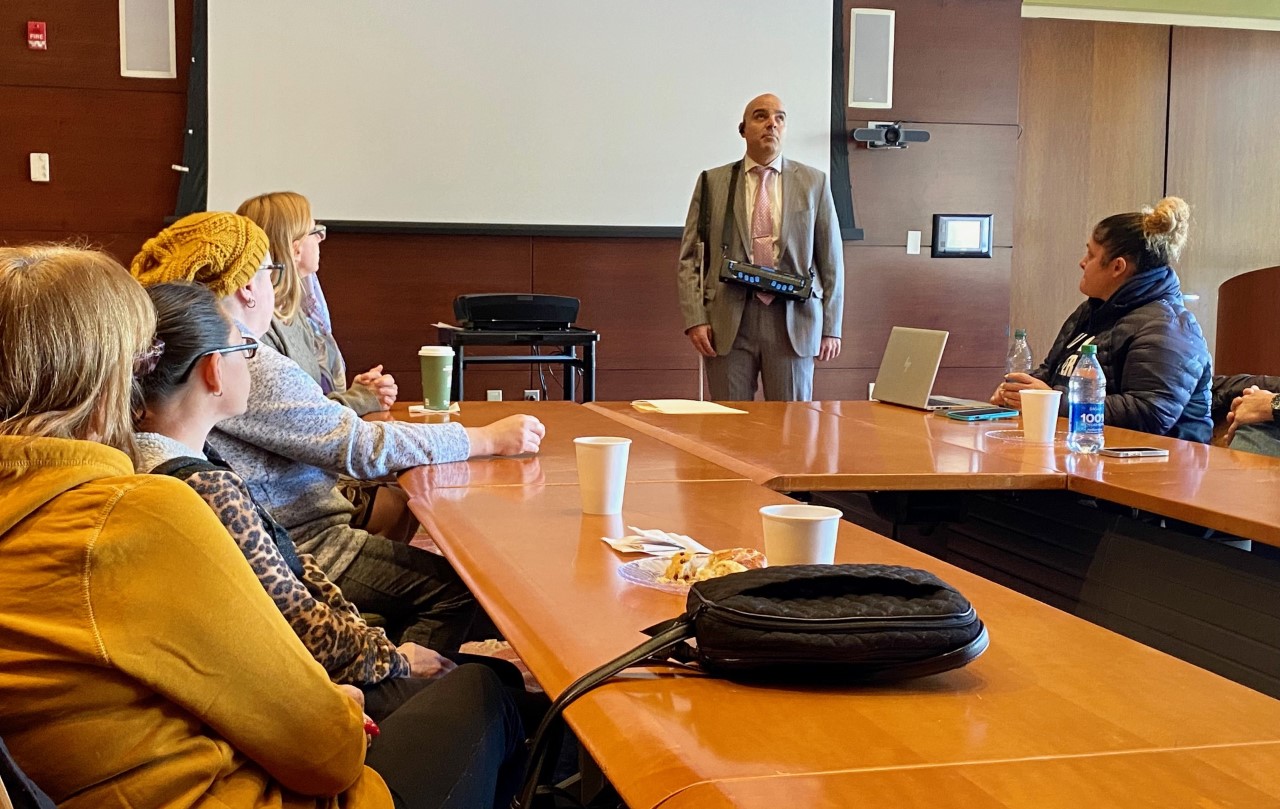 Photo of a man in a suit.